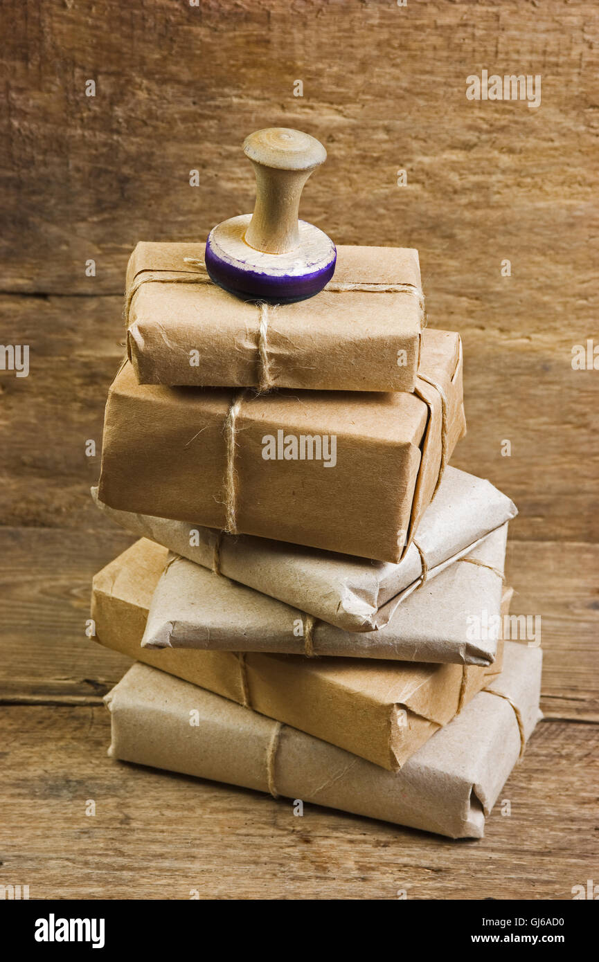 Postage on the background of an old board Stock Photo - Alamy