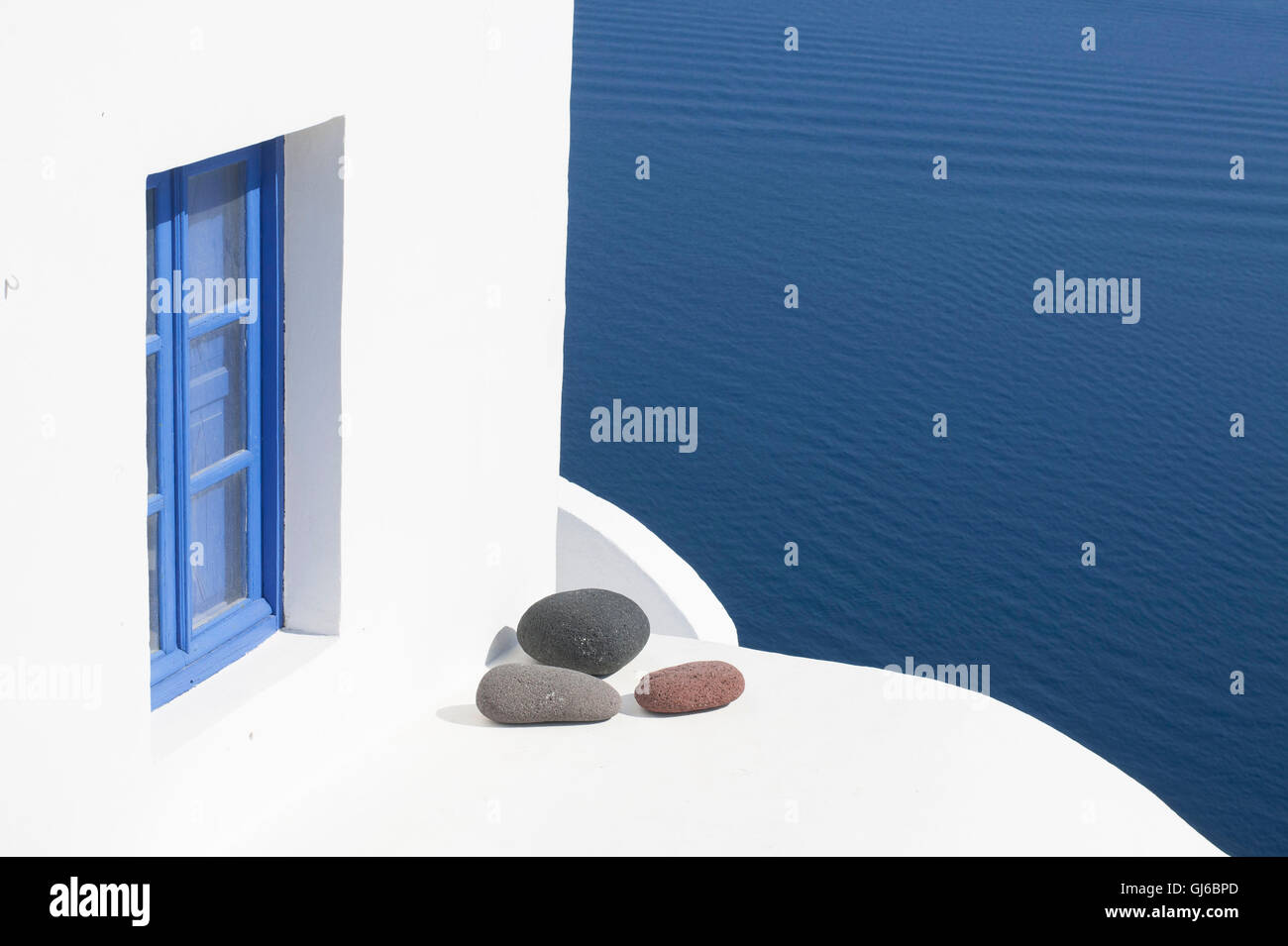 view to the Caldera with blue window, Oia, Santorini, Greece Stock ...