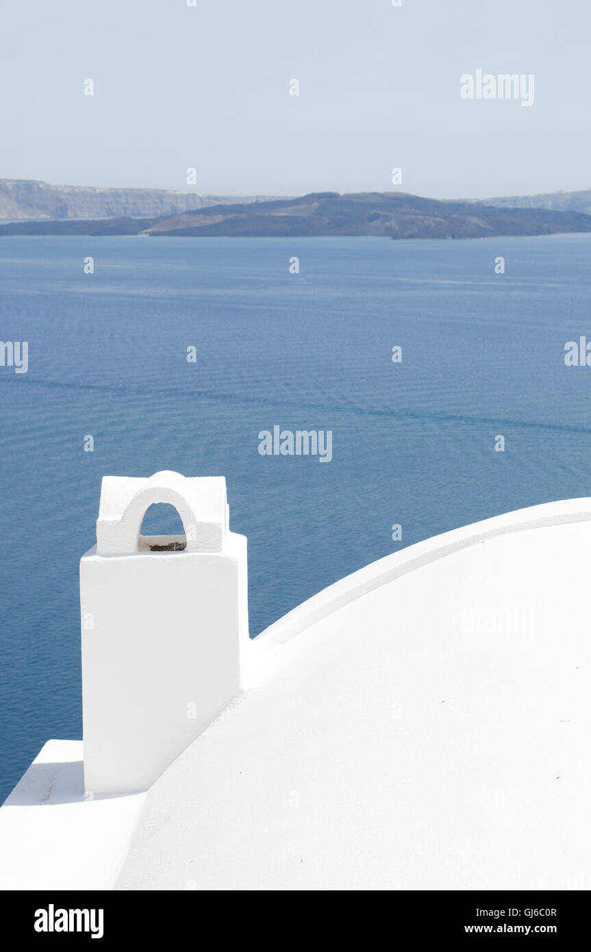view over a whitewashed roof on the Caldera of Santorin, Oia, Santorini ...