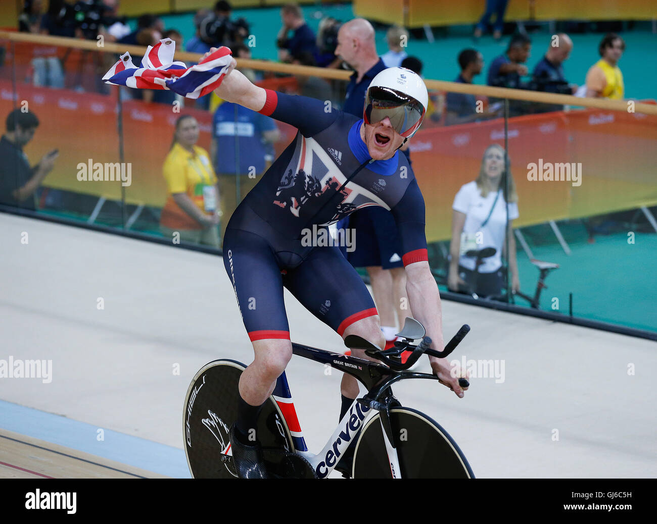 Ed Clancy celebrates crossing the line as the Great Britain team win ...