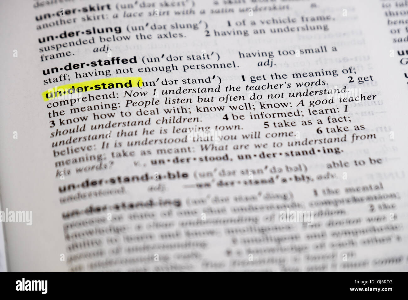 The word understand is highlighted and defined in a dictionary Stock ... The word understand is highlighted and defined in a dictionary Stock ...