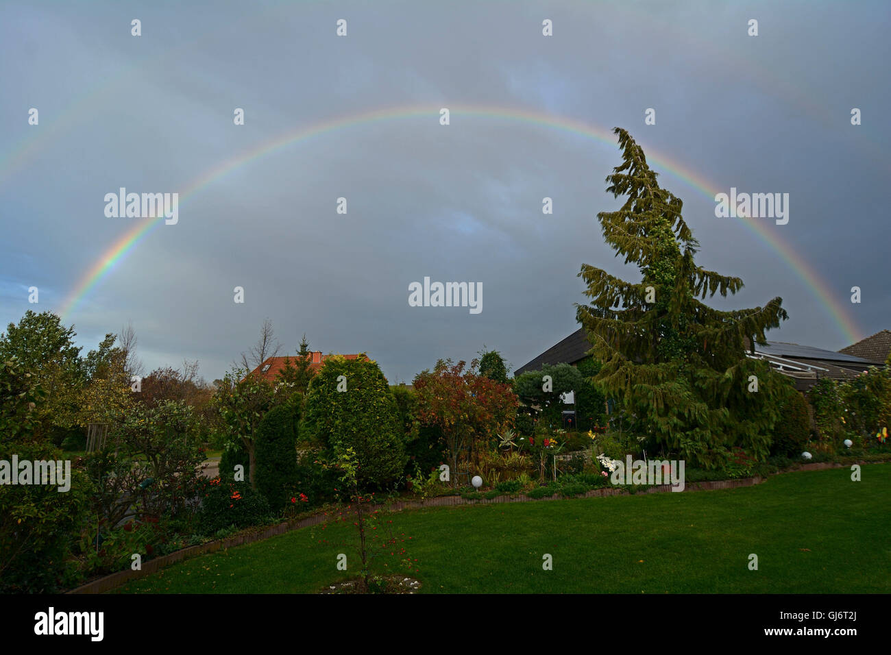 Rainbows over the land Stock Photo - Alamy