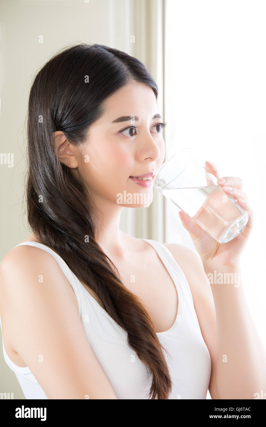 Happy Healthy asian Woman diet With Glass Of Water Stock Photo - Alamy