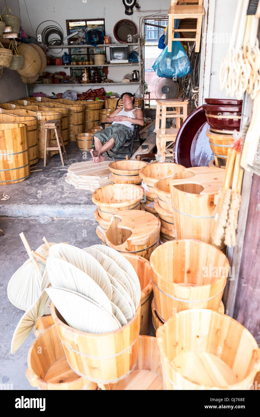 Street scene with small shops and craftsmen Stock Photo - Alamy