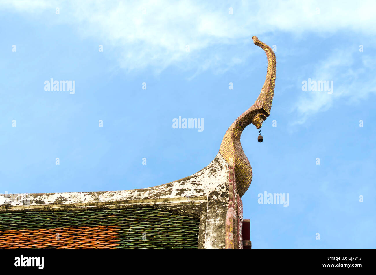 gable apex on the Buddhist temple with blue sky Stock Photo - Alamy
