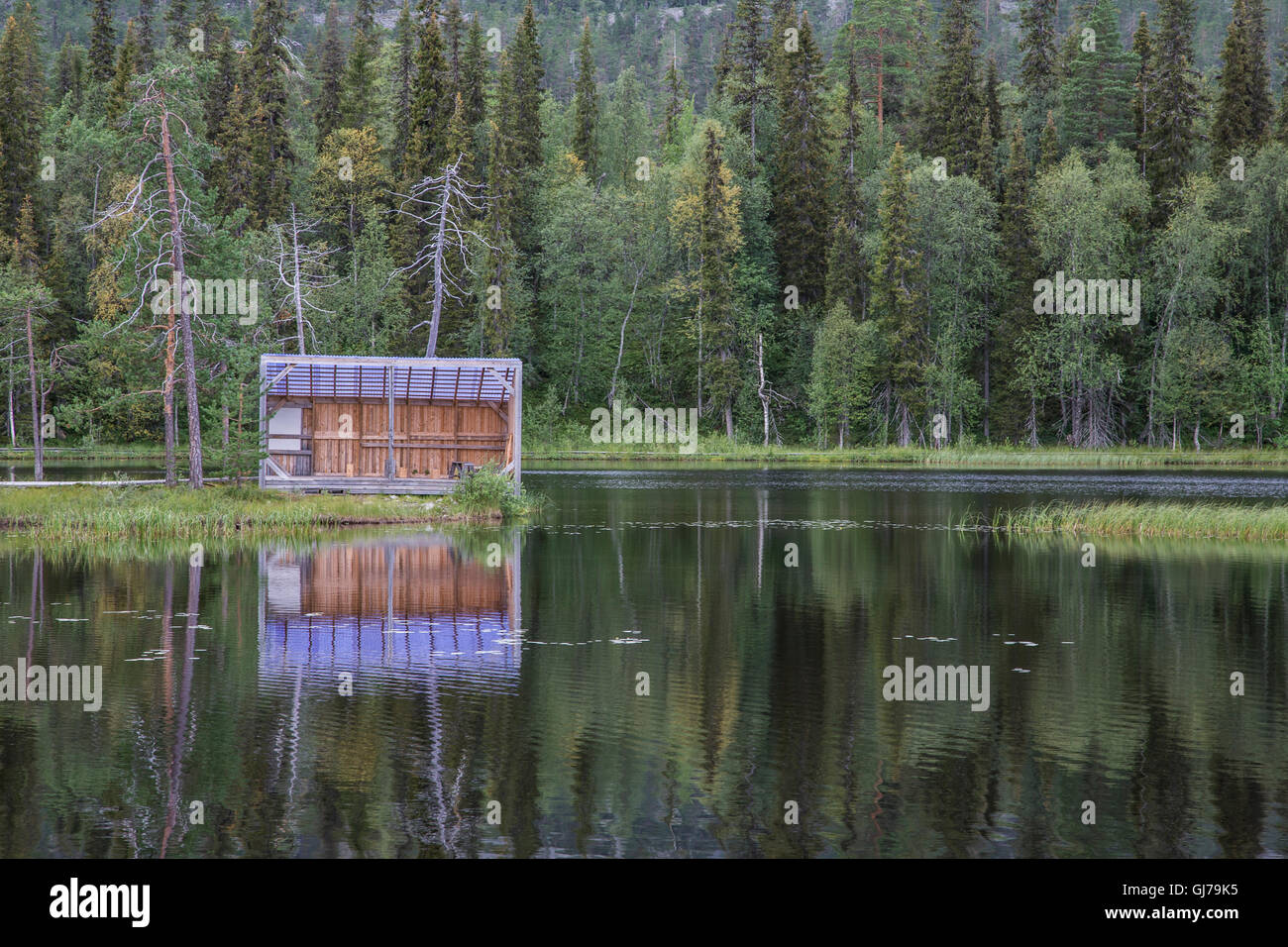 log cabbin by the lake in Finnish Lapland Stock Photo - Alamy