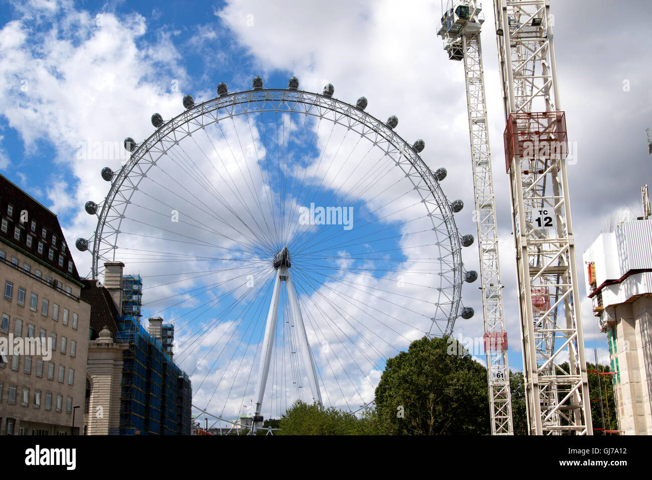 The London Eye giant Ferris wheel on the South Bank of the River Thames ...