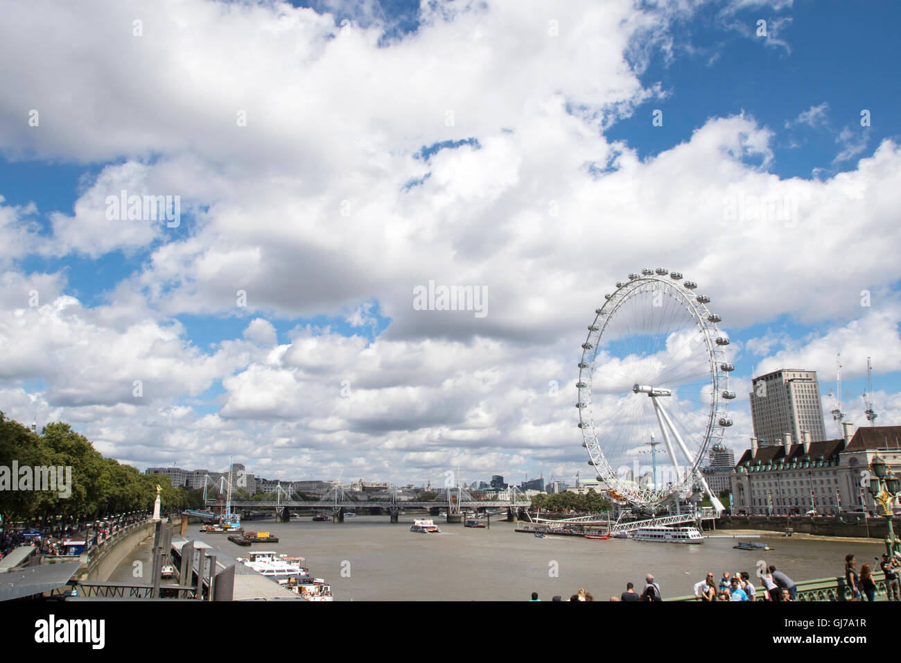 The London Eye giant Ferris wheel on the South Bank of the River Thames ...