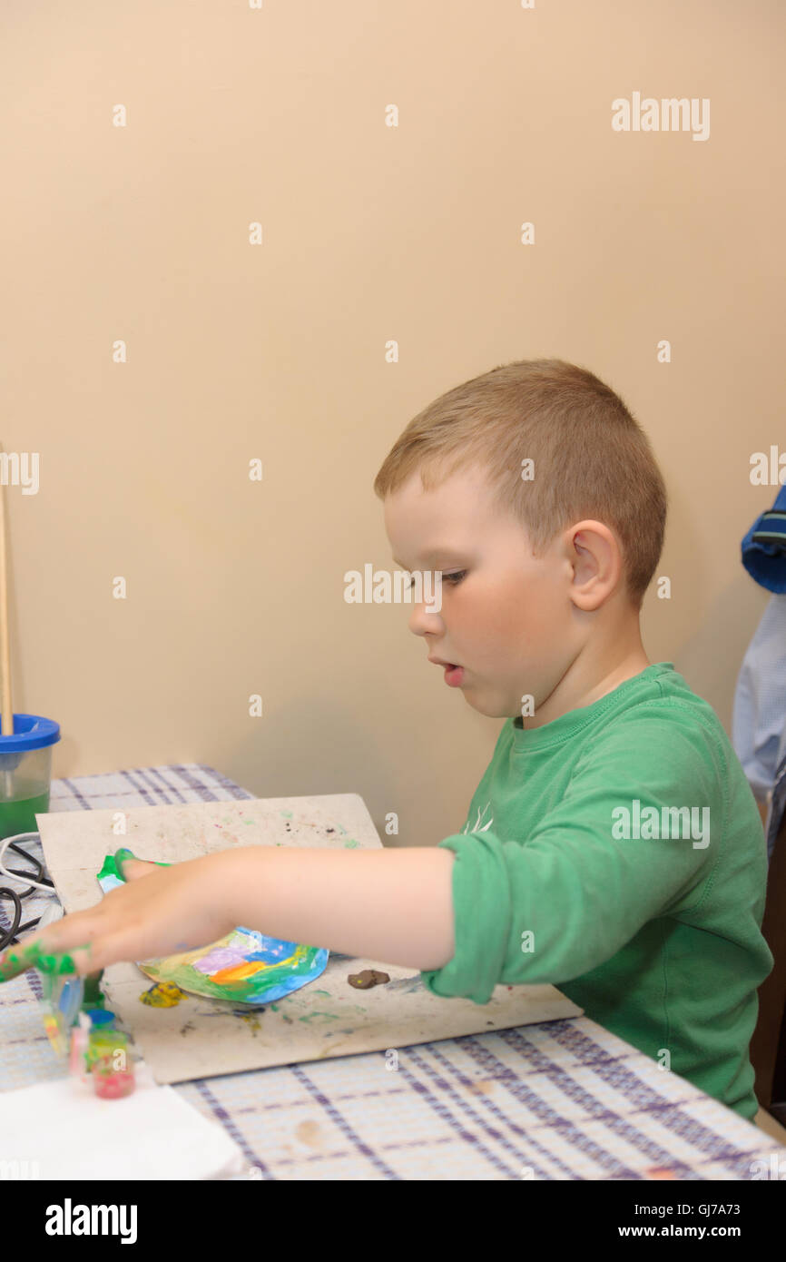 Boy table work hi-res stock photography and images - Alamy