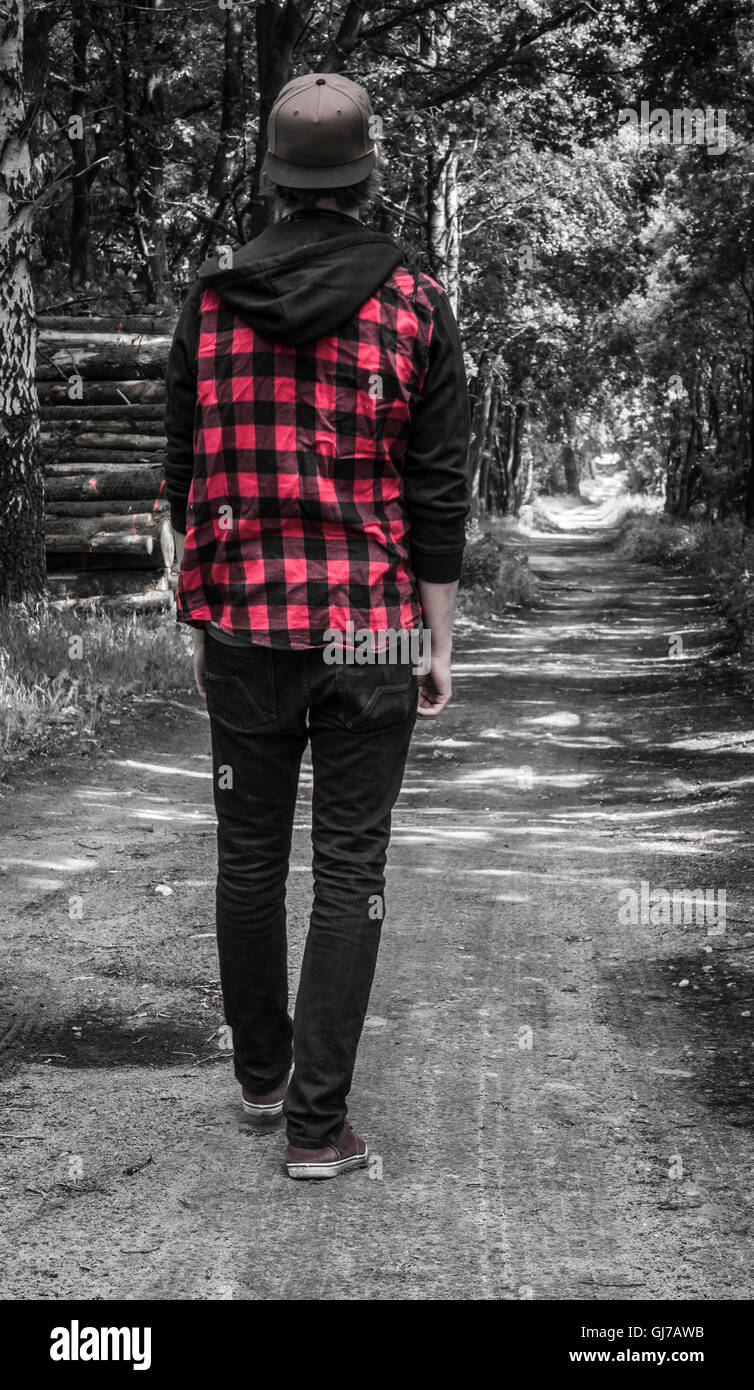 sad boy in rural landscape Stock Photo - Alamy