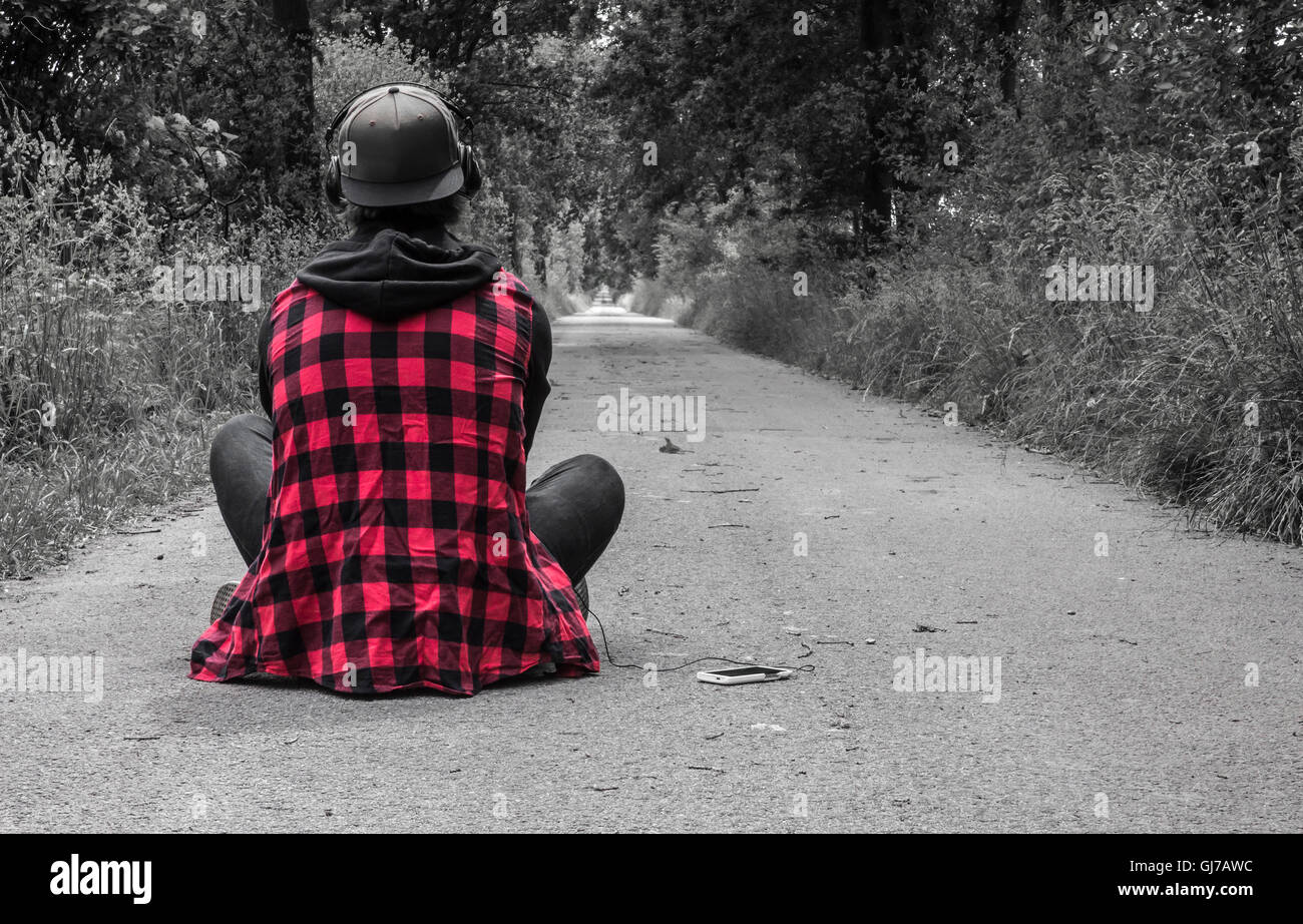 sad boy in rural landscape Stock Photo - Alamy