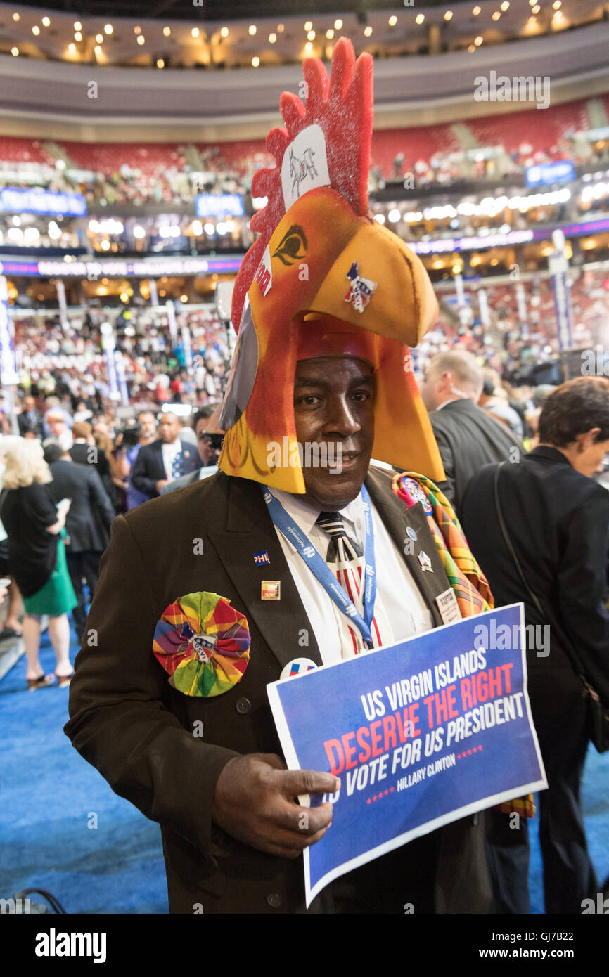 A Democratic delegate wears a chicken costume before the start of the ...