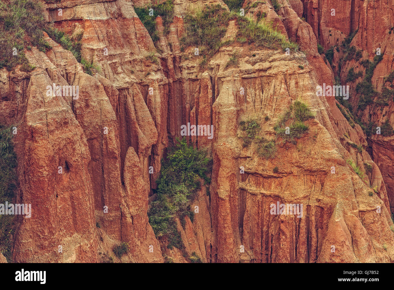 Spectacular view of a unique steep erosion sandstone cliff of the Red ...