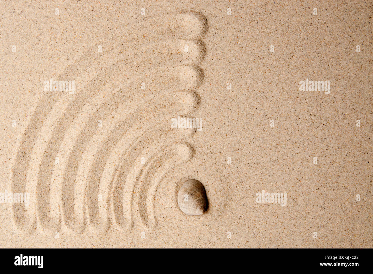 Symmetric lines in the sand Stock Photo - Alamy