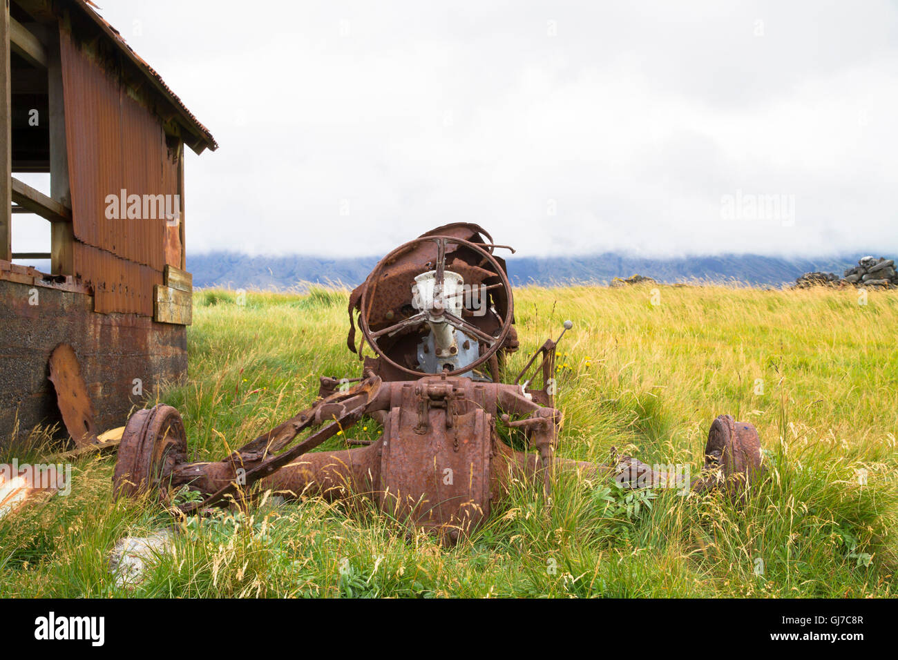 Abandoned derelict tractor in advanced stage of rusting to pieces Stock ...