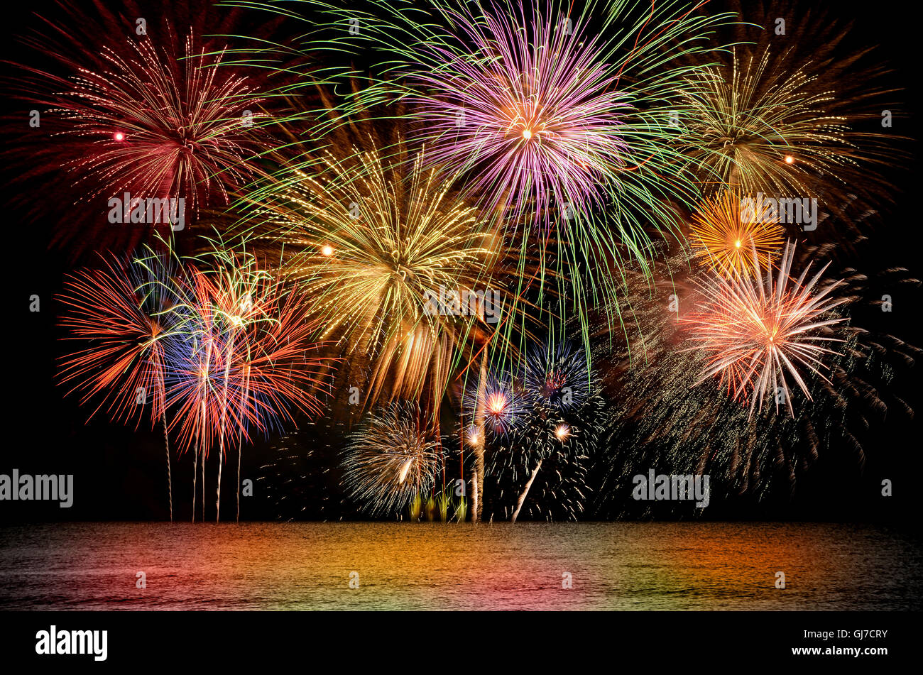 Colorful firework celebration on dark night sky background. Beautiful ...