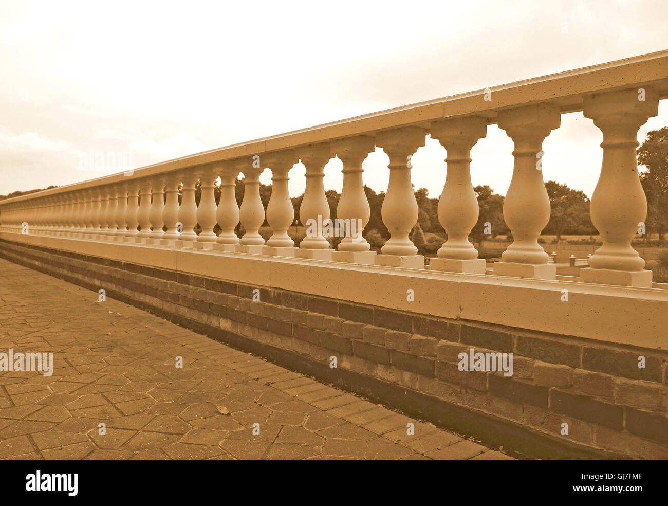 A long wall in a garden in the UK Stock Photo - Alamy