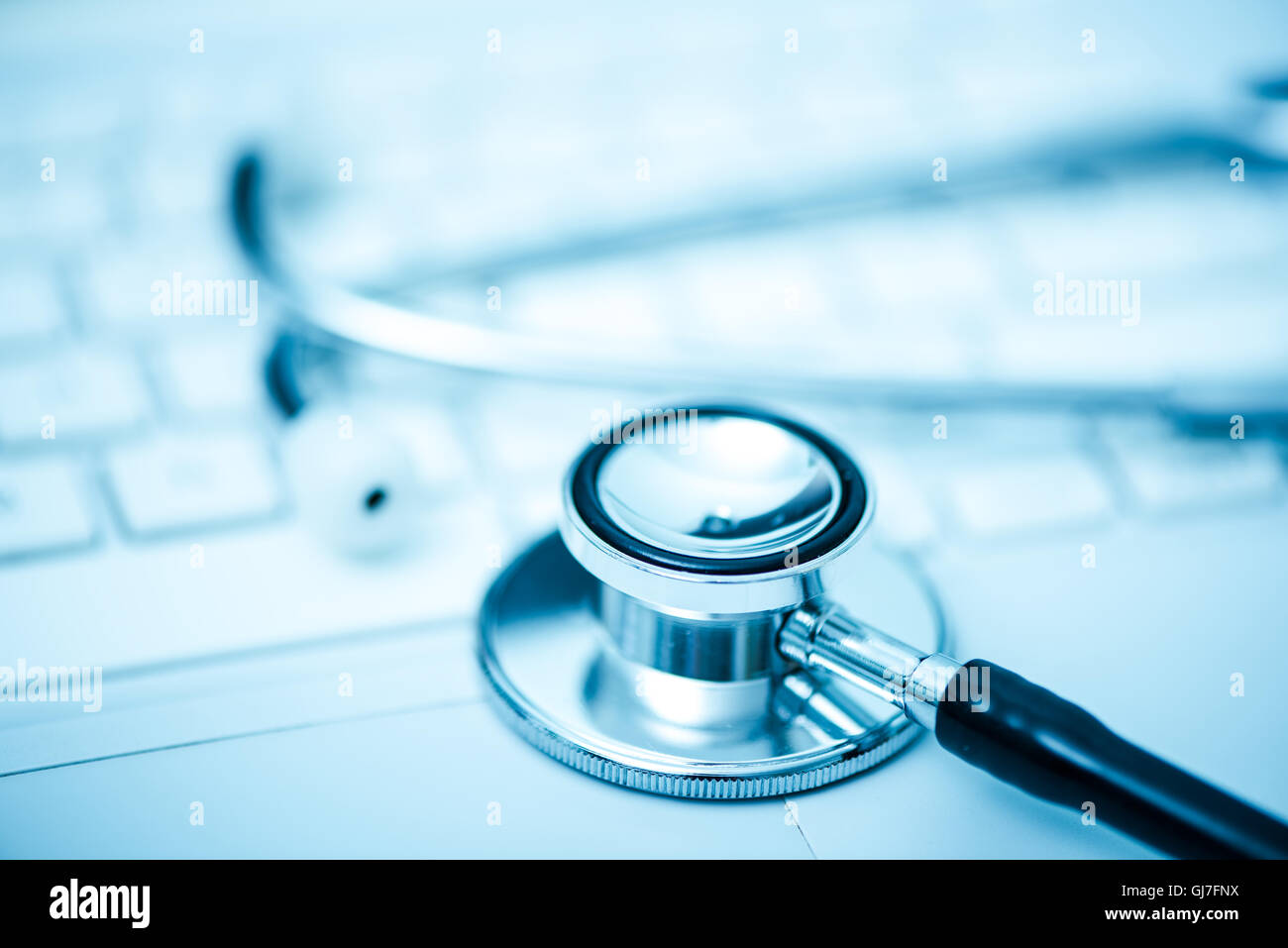 toned medical concept, stetoscope and computer Stock Photo - Alamy