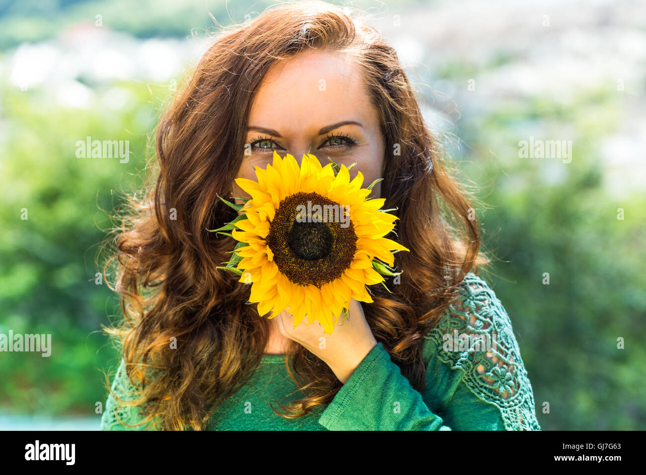 beautiful woman with sunflower, summer joy and happines Stock Photo - Alamy