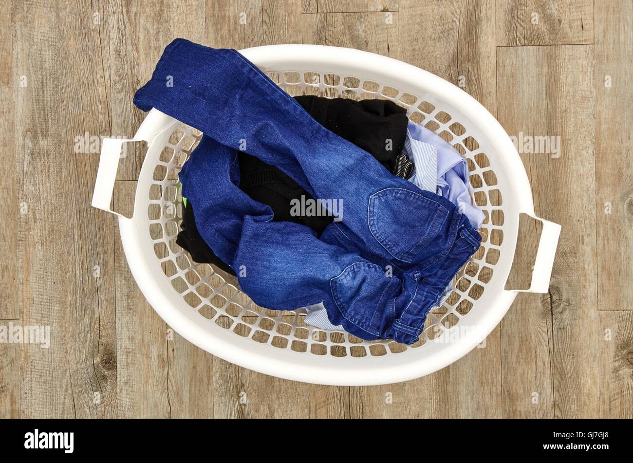 A studio photo of a laundry washing basket Stock Photo - Alamy