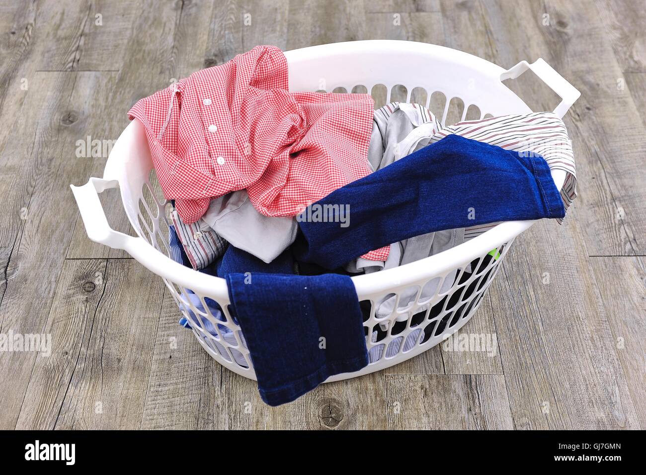 A studio photo of a laundry washing basket Stock Photo - Alamy