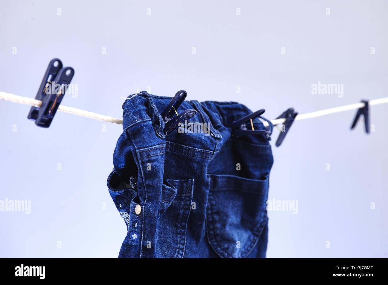 A studio photo of a clothes line Stock Photo - Alamy