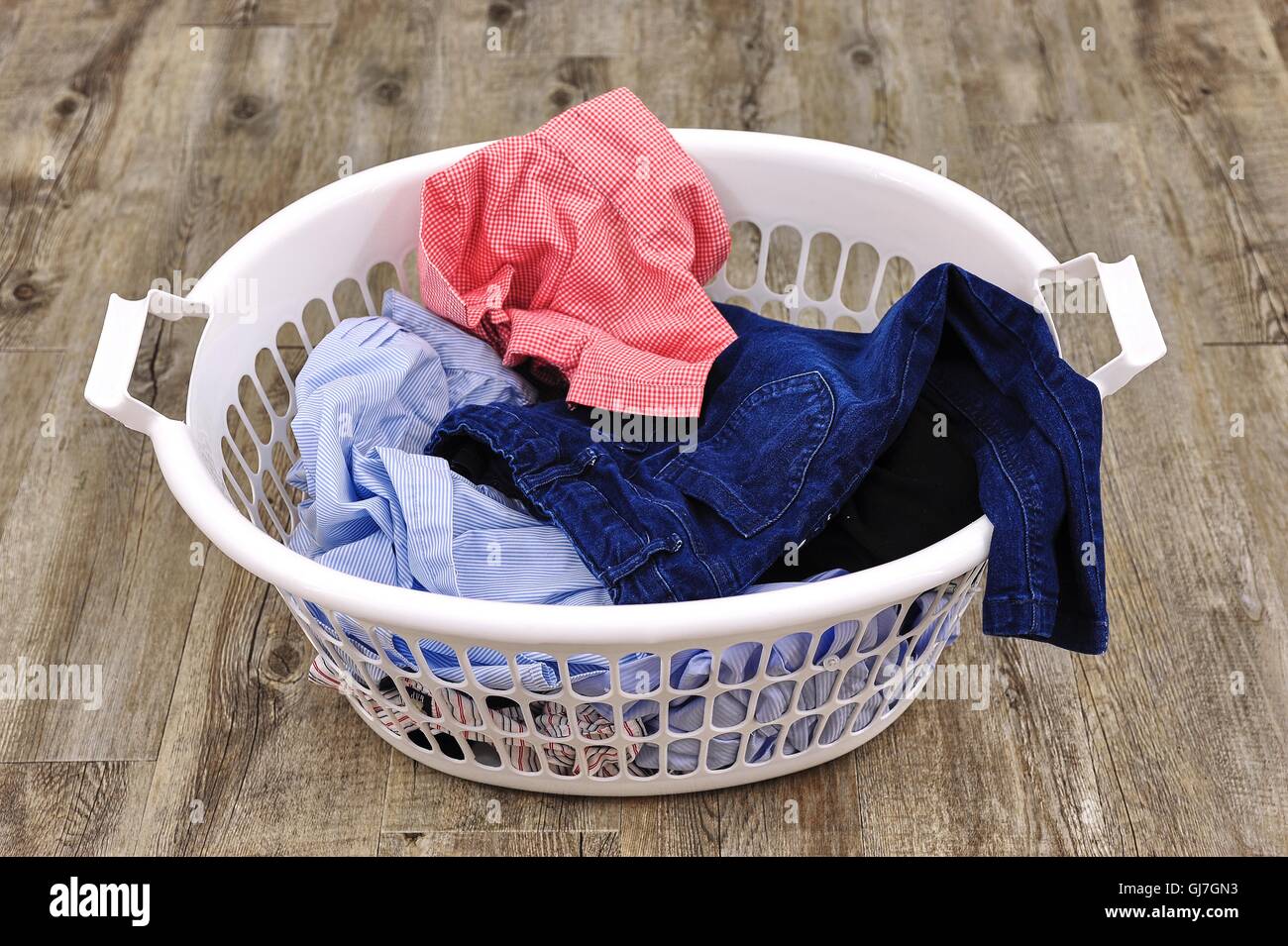 A studio photo of a laundry washing basket Stock Photo - Alamy