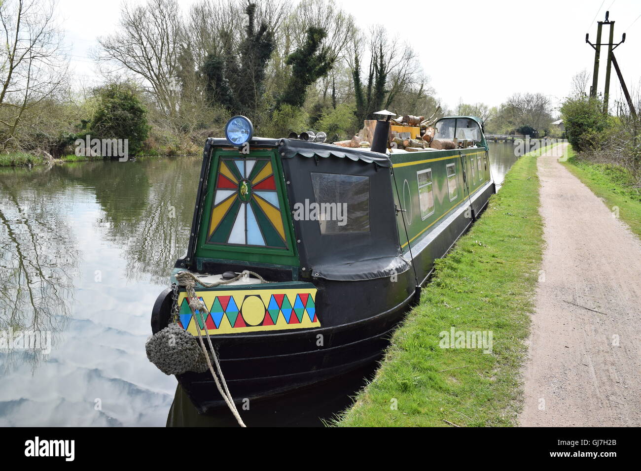 Long Canal Boat in a Canal Stock Photo - Alamy