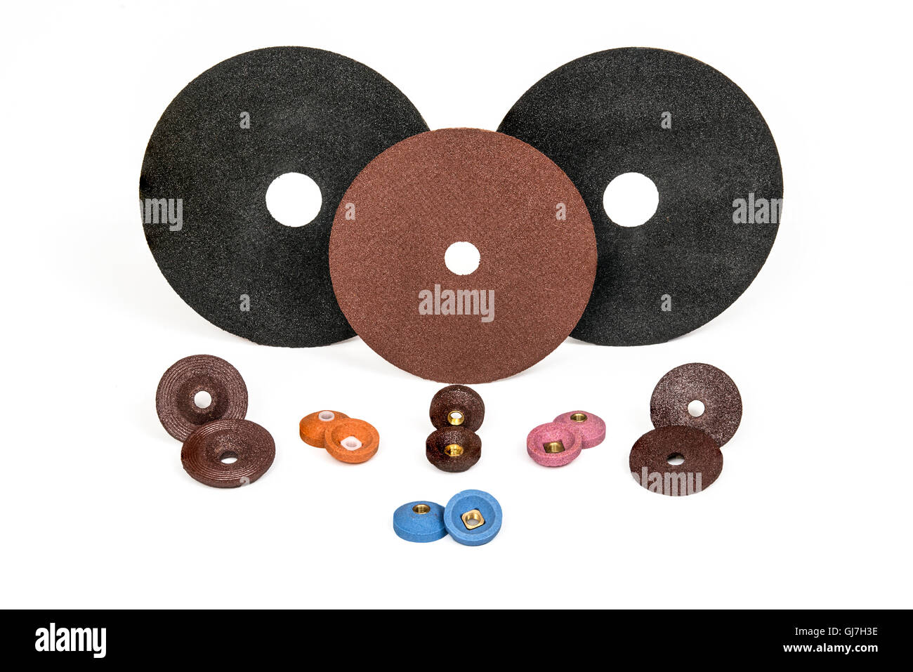 Grinding and polishing wheels on white background Stock Photo - Alamy