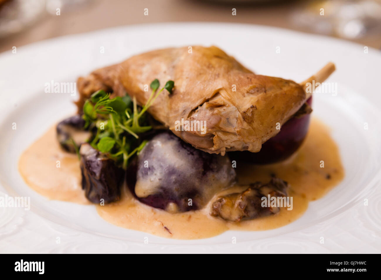 Stewed rabbit leg Stock Photo - Alamy