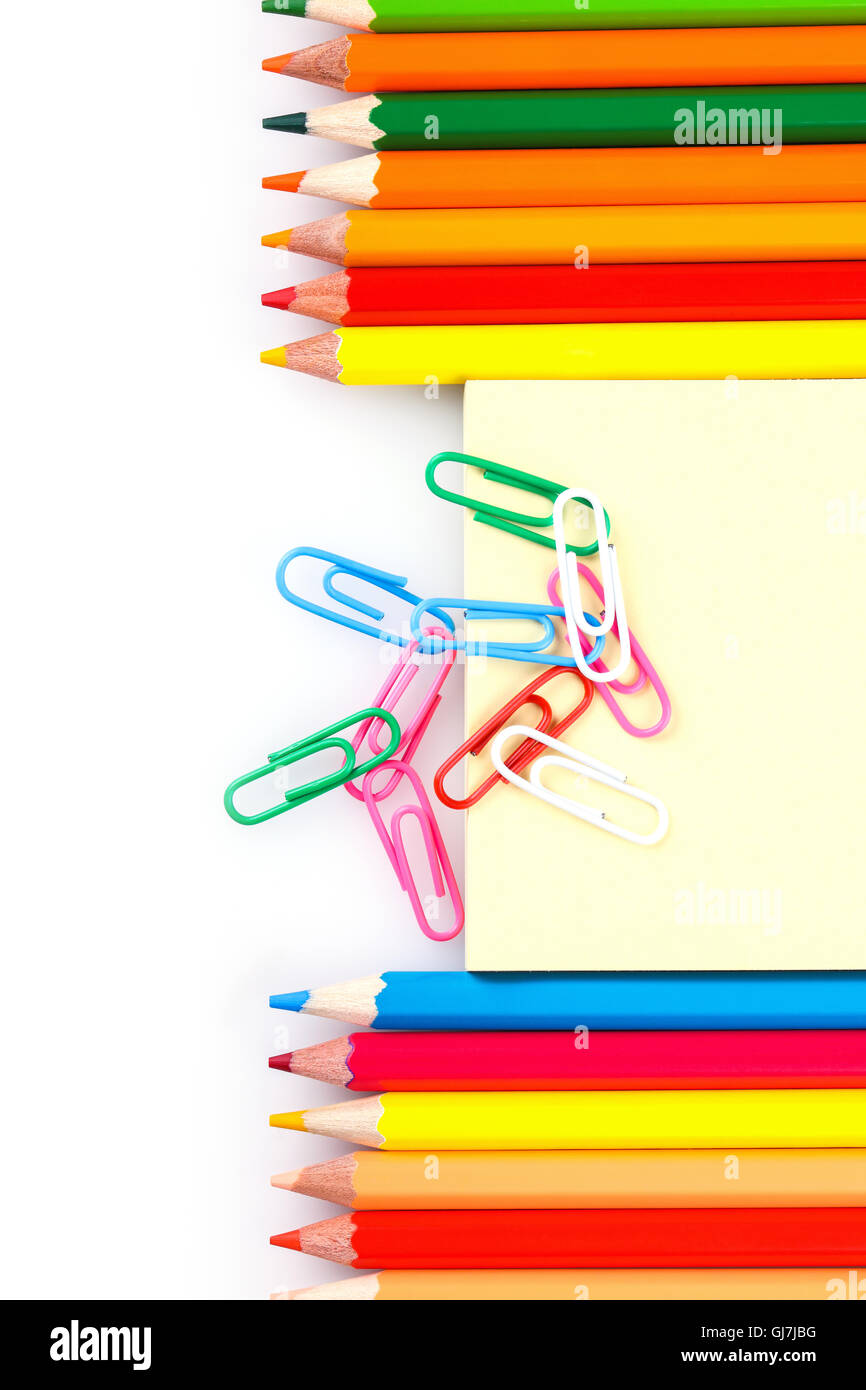 set of colored pencils and paper clips on a white background Stock ...