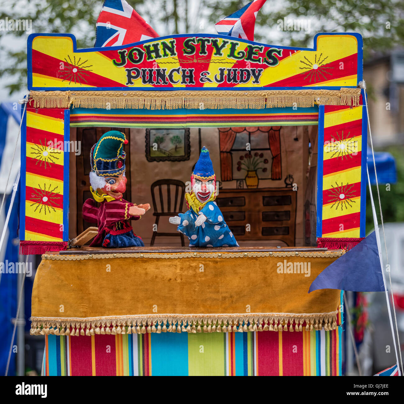 Mr Punch with Joey The Clown in a Punch and Judy booth Stock Photo - Alamy