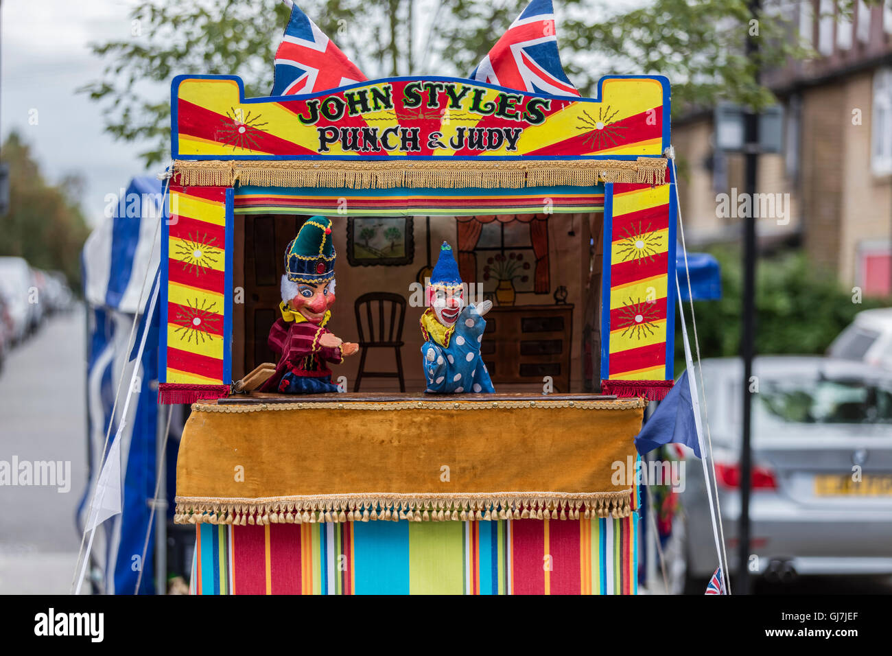Mr Punch with Joey The Clown in front of a Punch and Judy puppet booth ...