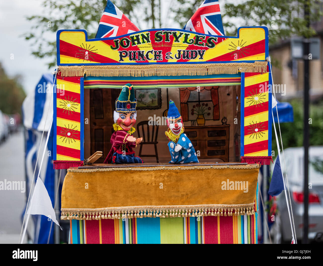 Mr Punch with Joey The Clown puppets at a Punch and Judy puppet booth ...
