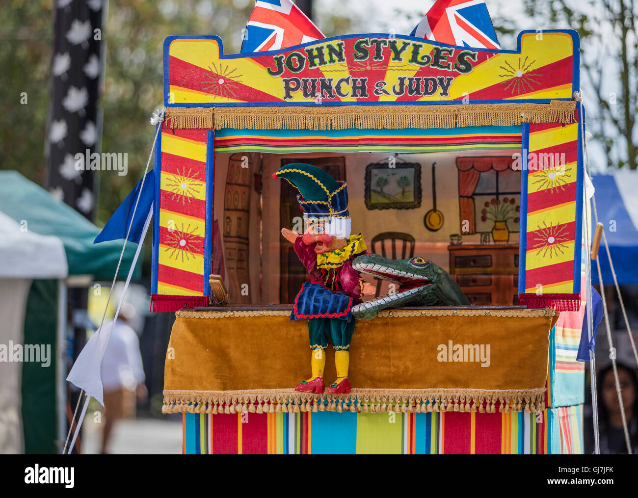 Mr Punch and the crocodile glove puppets in a Punch and Judy glove ...
