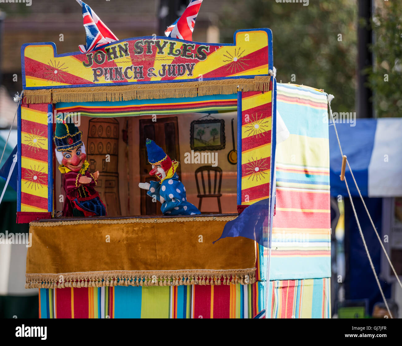 Mr Punch and Joey The Clown in a Punch and Judy puppet booth Stock ...