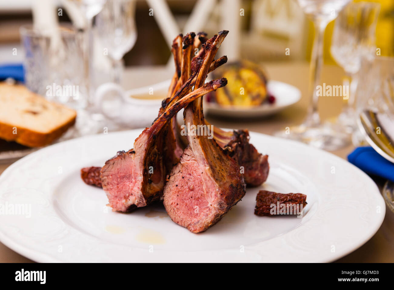 Lamb rack on a plate Stock Photo - Alamy