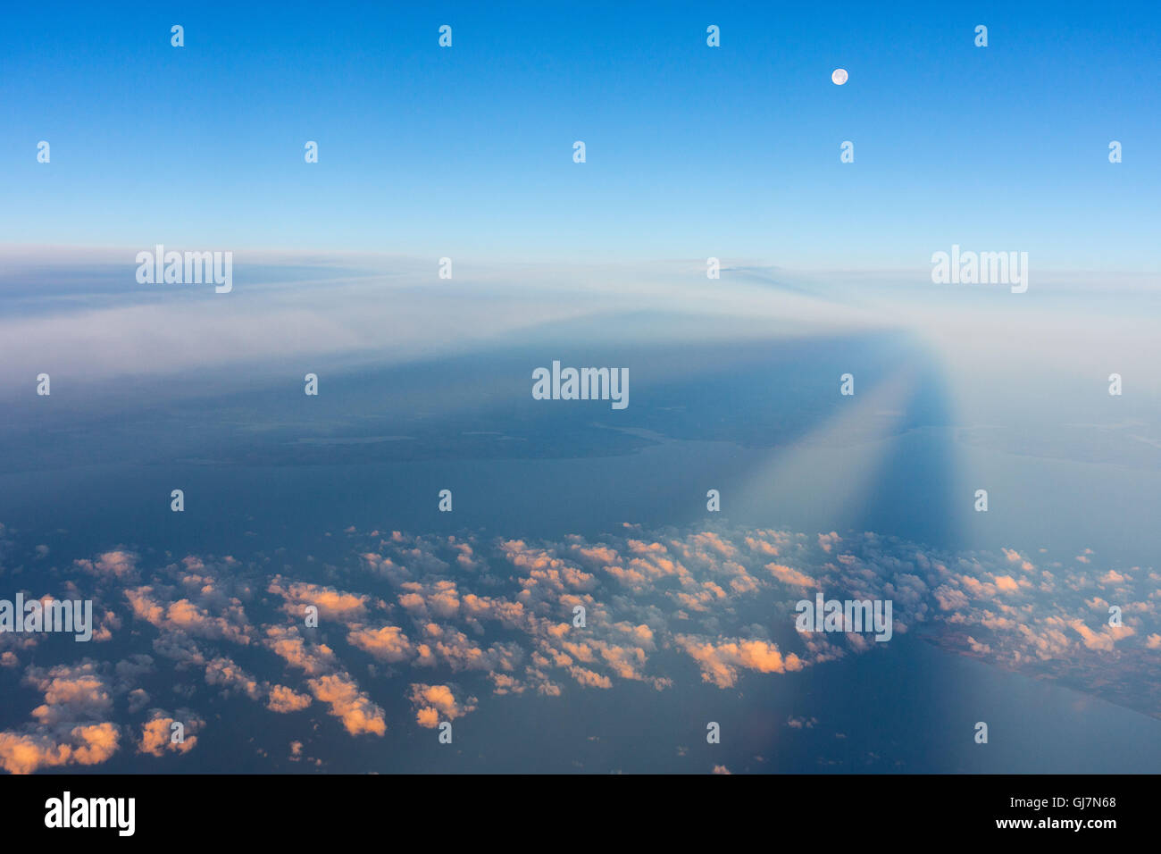 Flight, moon, clouds, sunrise Stock Photo - Alamy