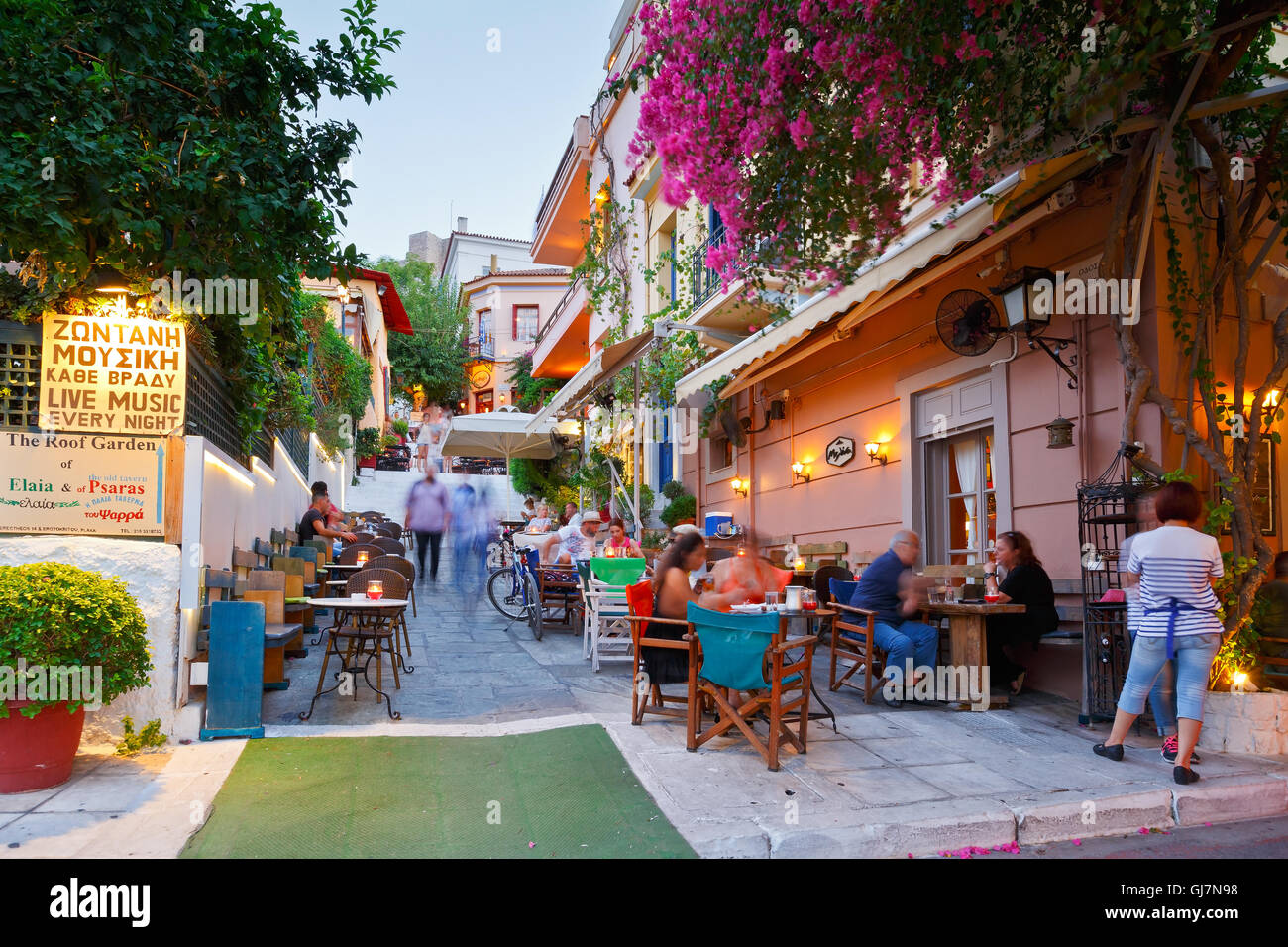 People having drinks in the old town of Plaka Stock Photo - Alamy