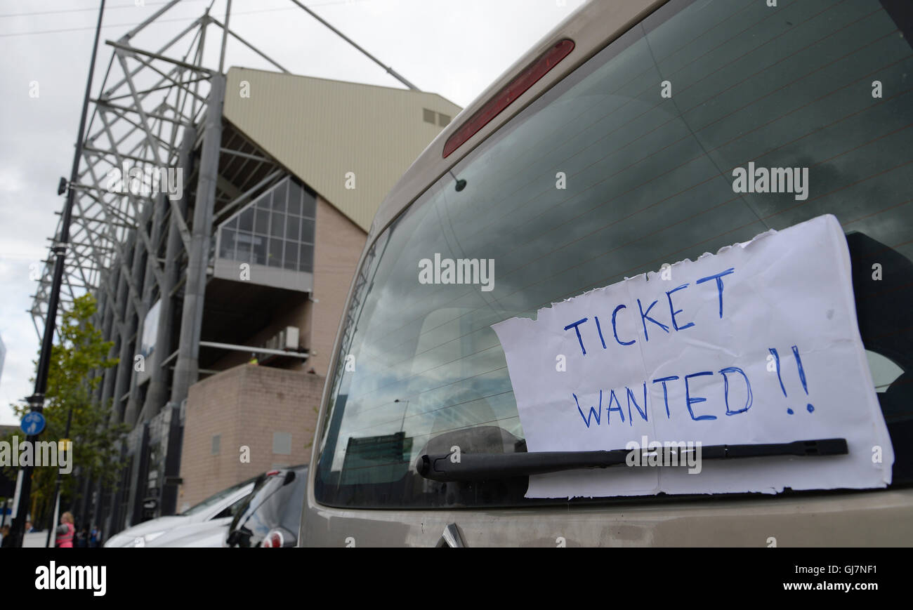 A car with a 'ticket wanted' sign parked outside the ground ahead of ...
