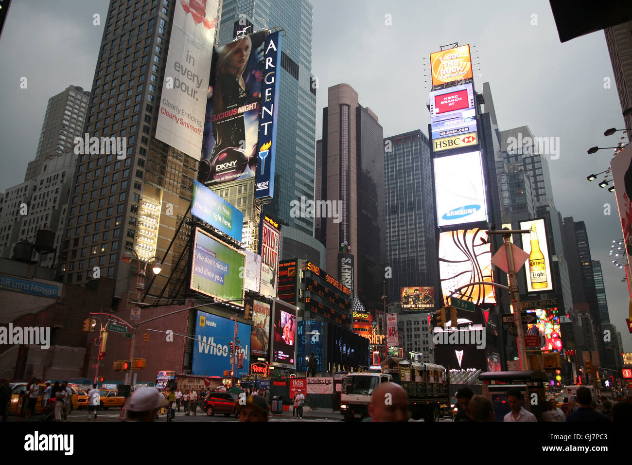 Broadway with neon signs on the facades Stock Photo - Alamy