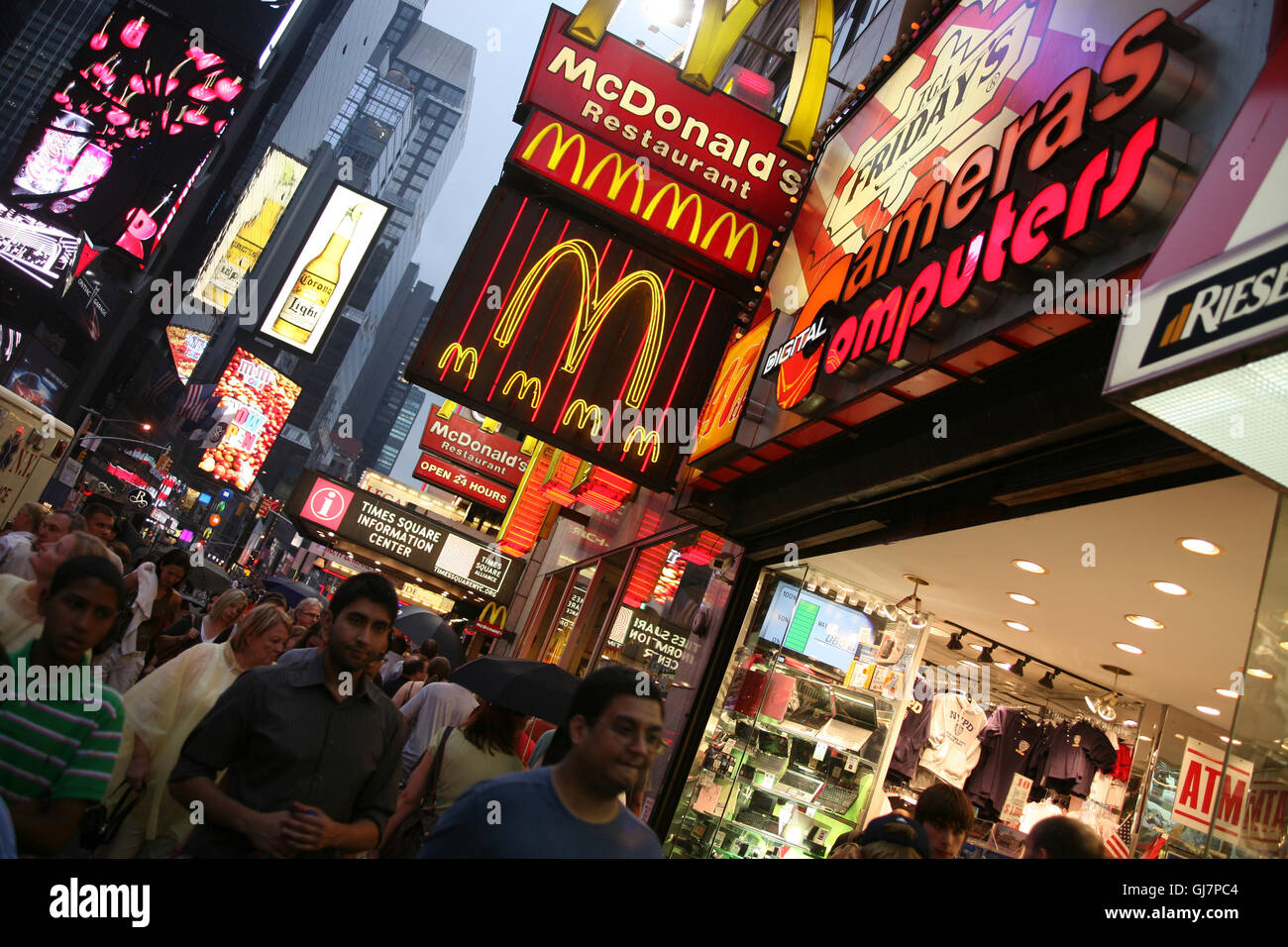 Broadway with neon signs on evenings Stock Photo - Alamy