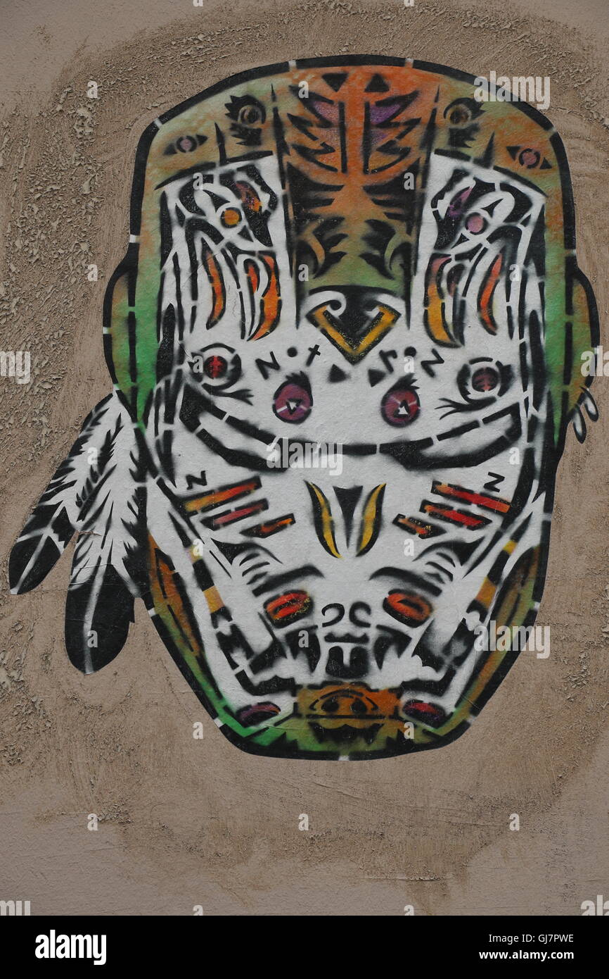 Street art in Paris representing a mask Stock Photo - Alamy
