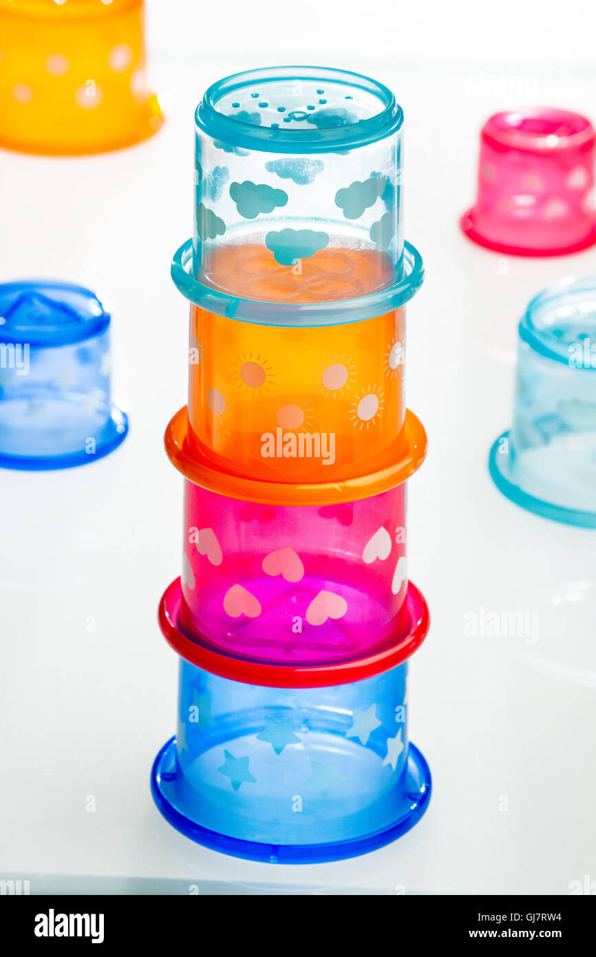 Stack of shakers, colourful Stock Photo - Alamy