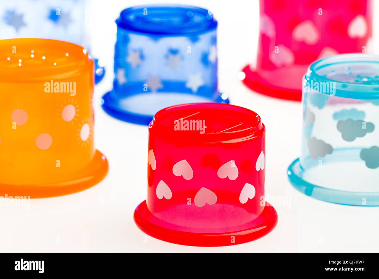 Shakers to stack, colourful Stock Photo - Alamy