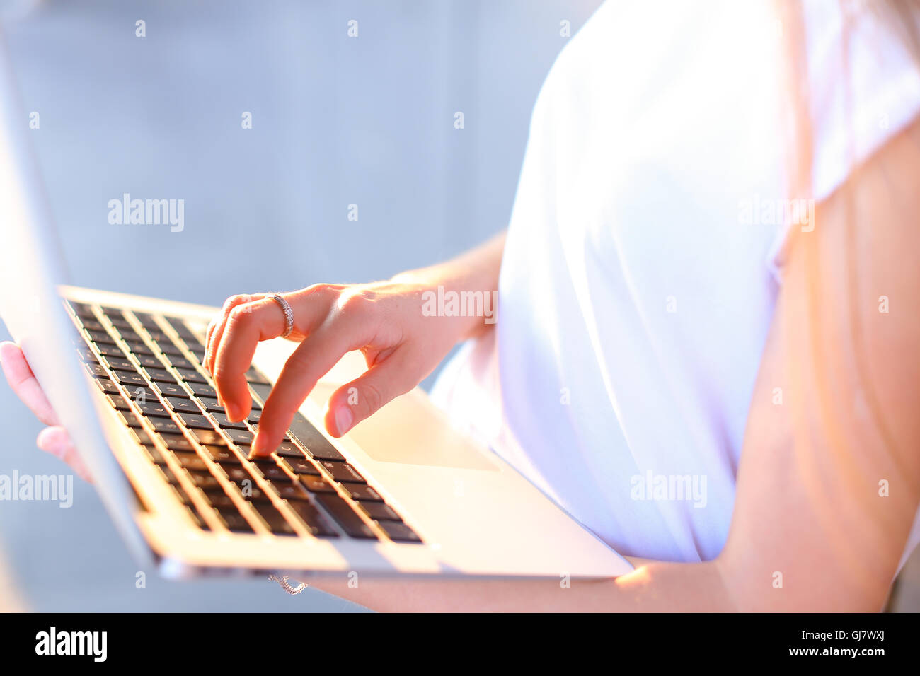 Hand lady press tauchpad keyboard on laptop. Young beautiful female ...