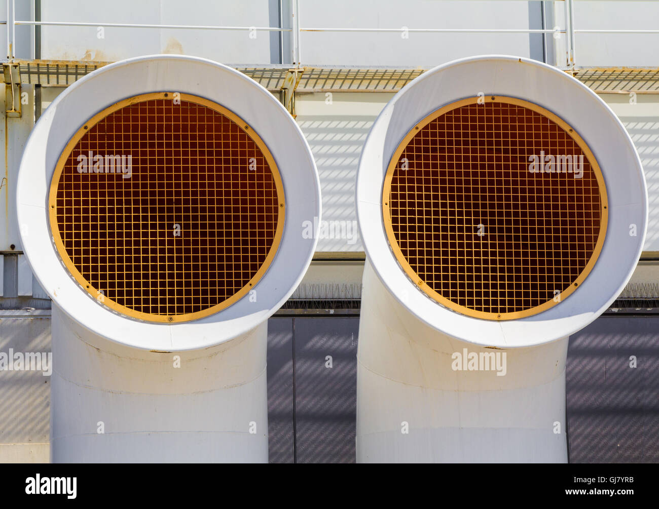 A pair of ships funnels painted white Stock Photo - Alamy