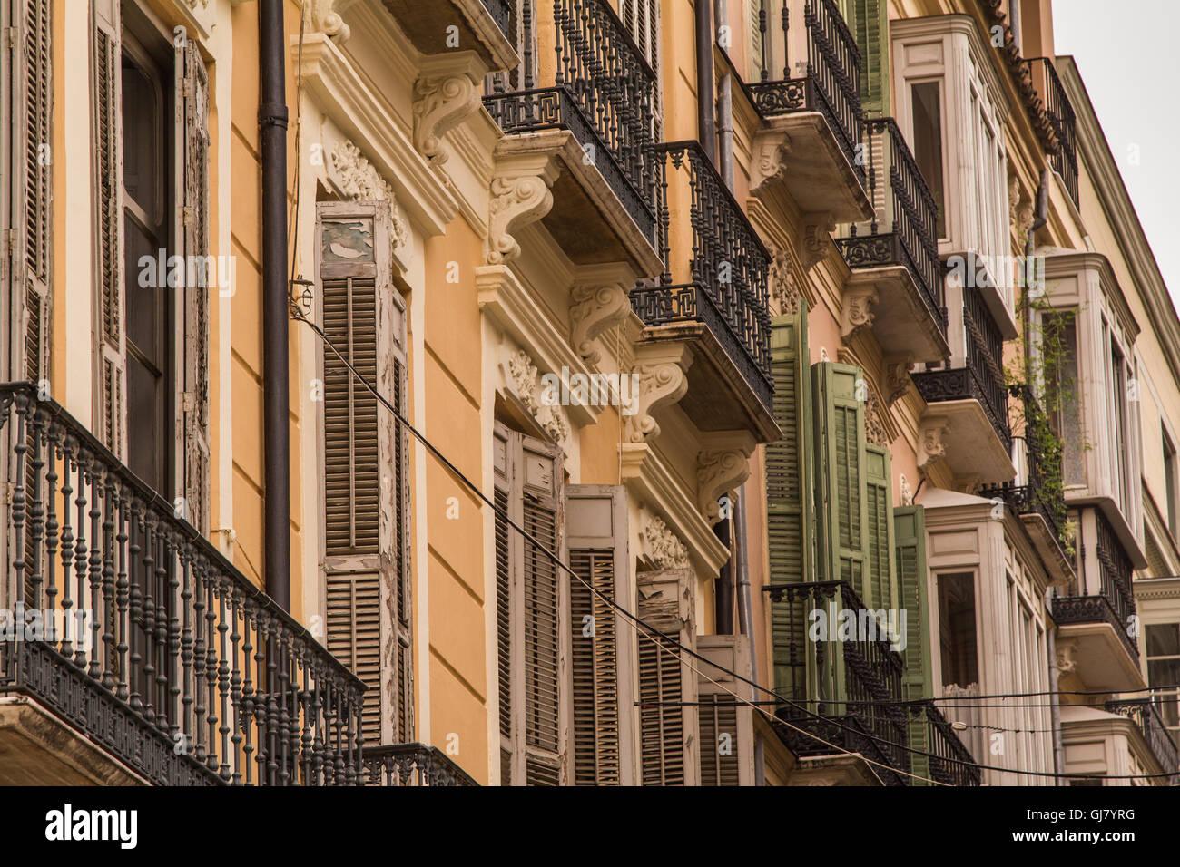 Windows and Balcony, on a cream painted building Stock Photo - Alamy