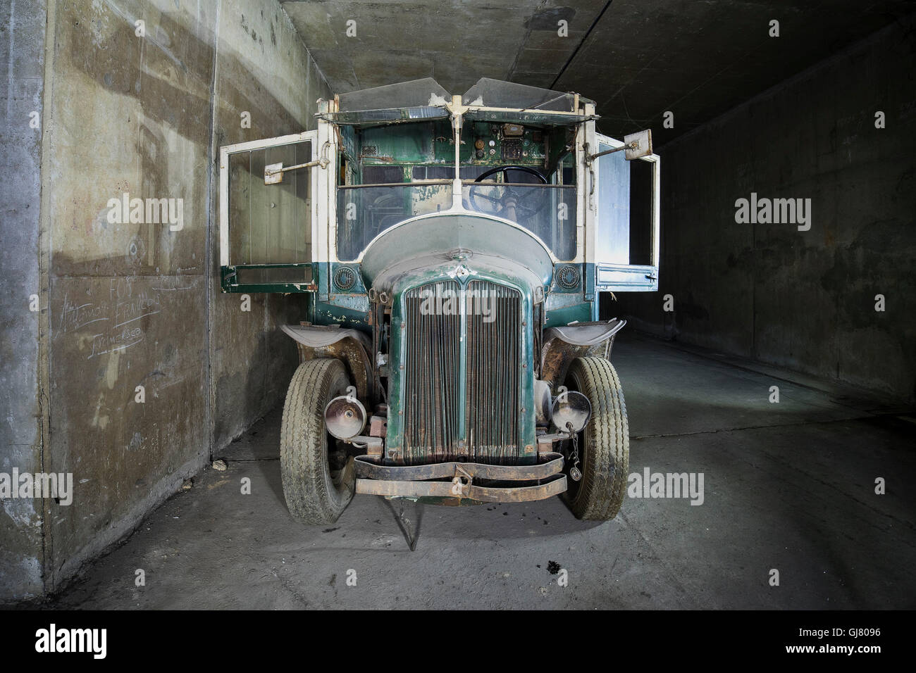 very old bus parked in a tunnel Stock Photo - Alamy
