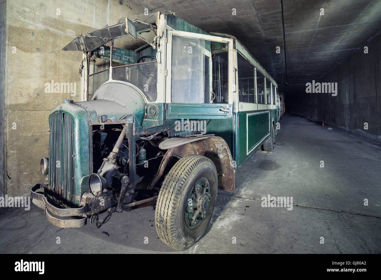 very old bus parked in a tunnel Stock Photo - Alamy